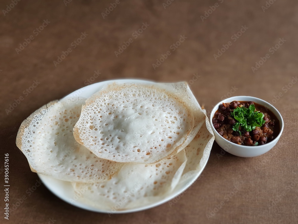 Hoppers with black chickpea gravy, A South Indian breakfast delicacy ...