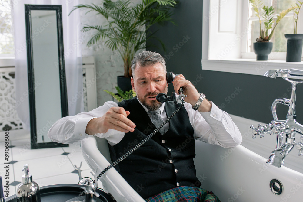 handsome mature courageous stylish man scotsman in kilt and suit ...