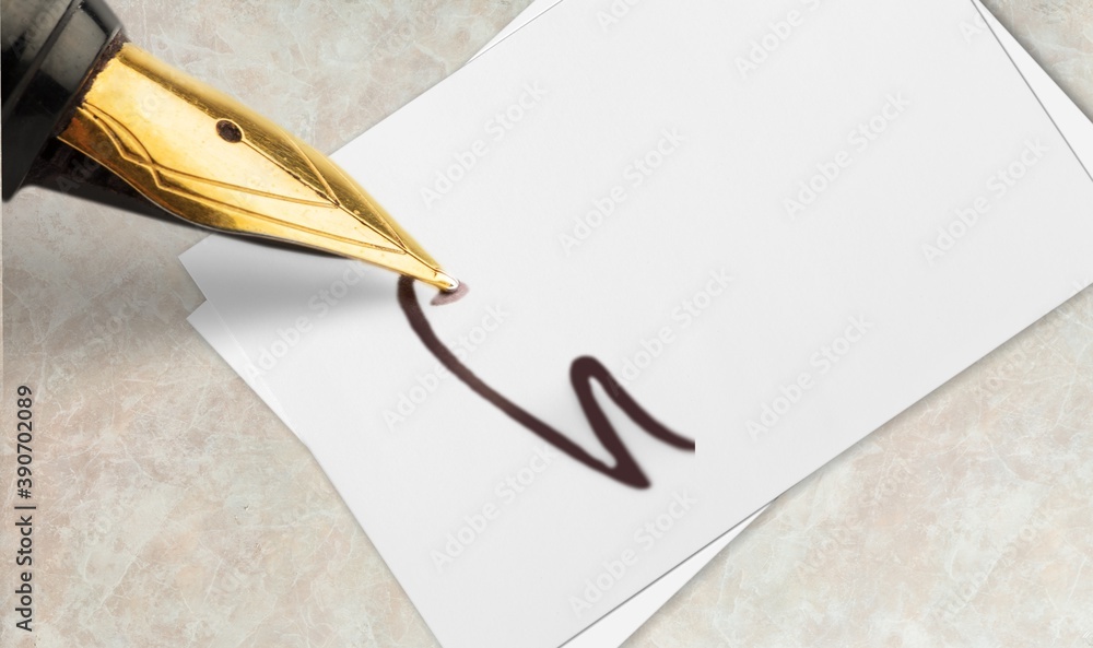 Signing a signature with a classic fountain pen Stock Photo | Adobe Stock