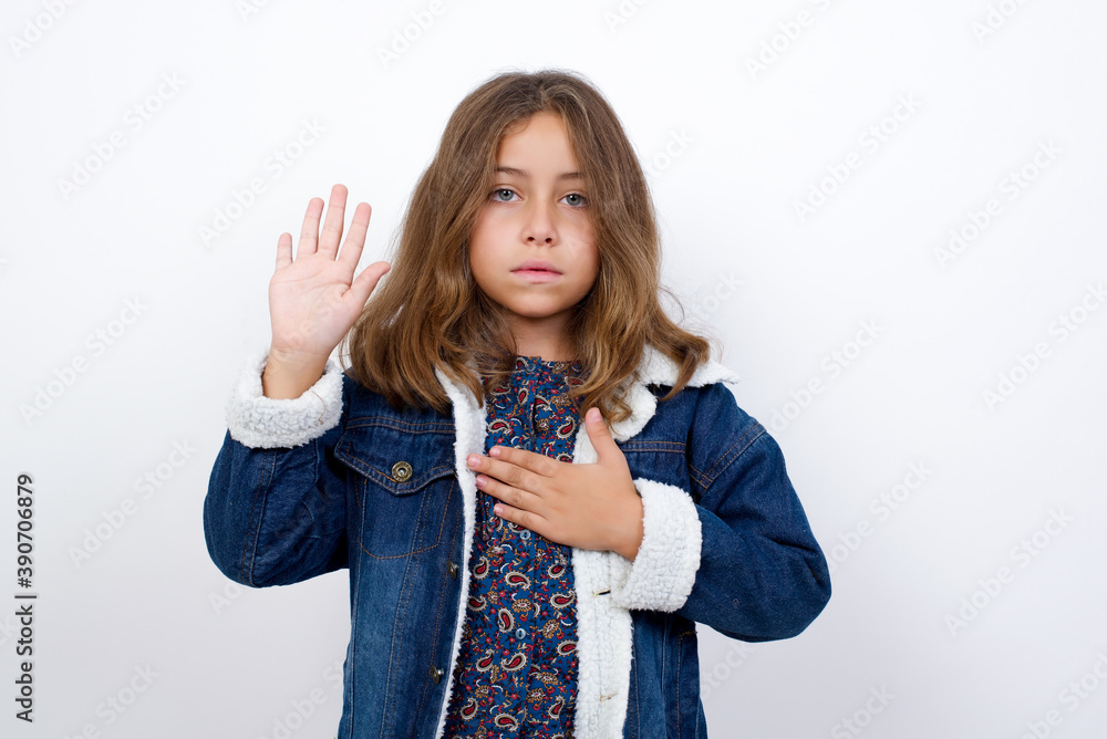 Little caucasian girl with beautiful blue eyes wearing denim jacket ...