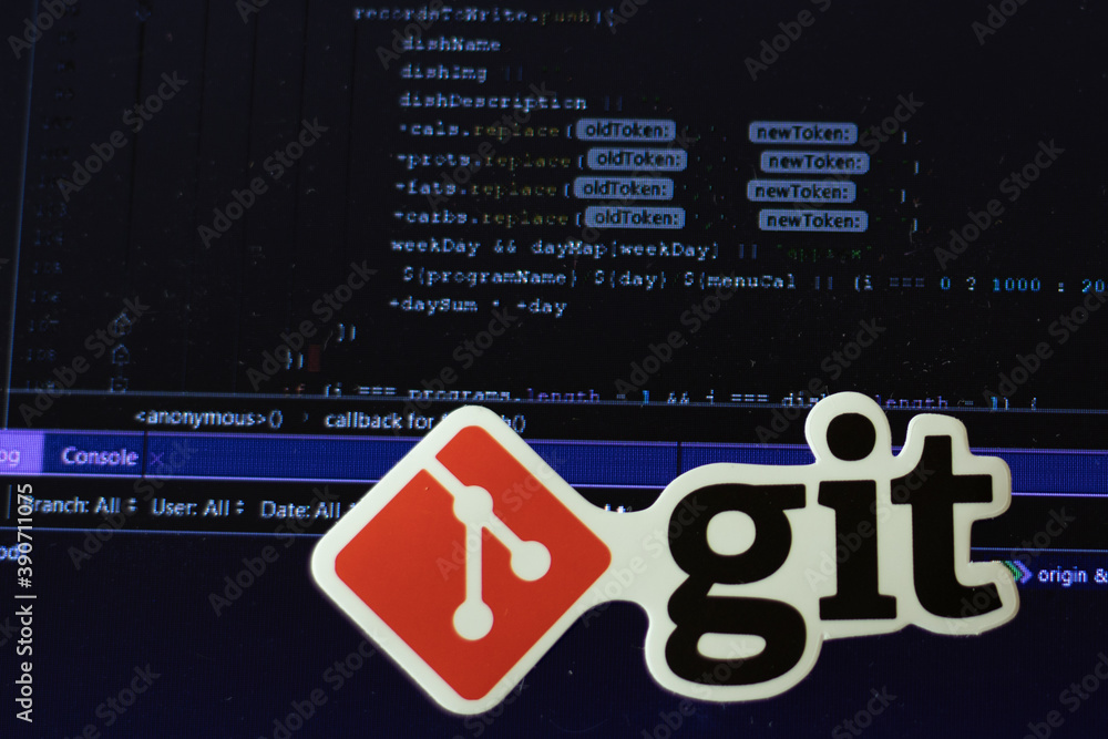 Moscow, Russia - 1 June 2020: Git logo sign with program code on ...