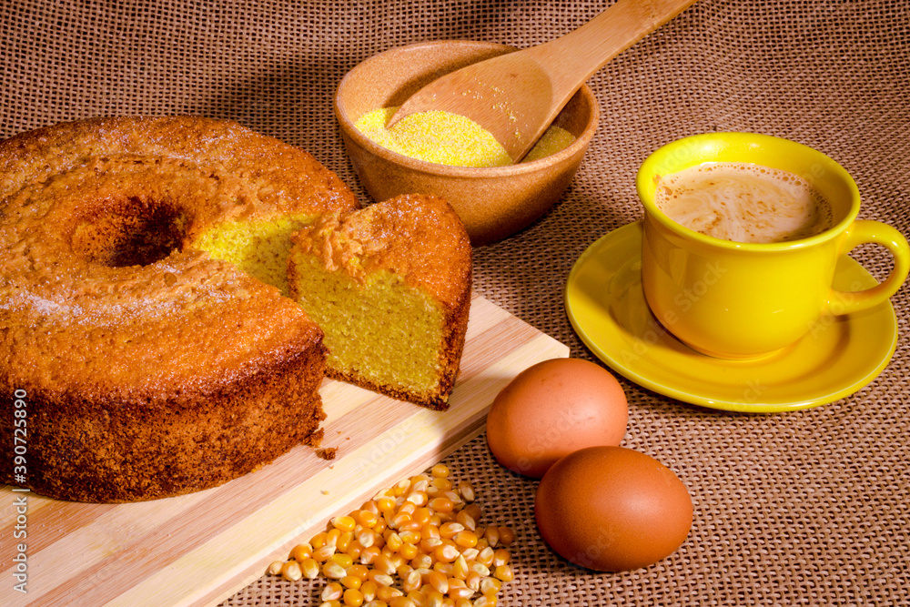 Brazilian corn cake made with a type of corn flour (Fuba) on the wood ...