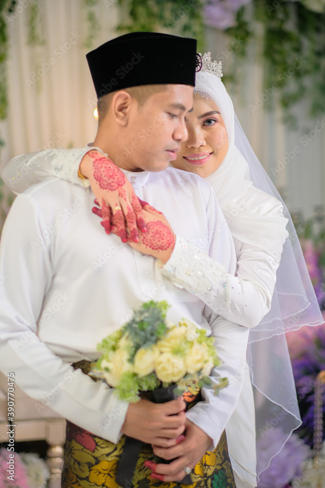 Indoor shooting for Malay wedding, the bride and groom wearing Malay ...
