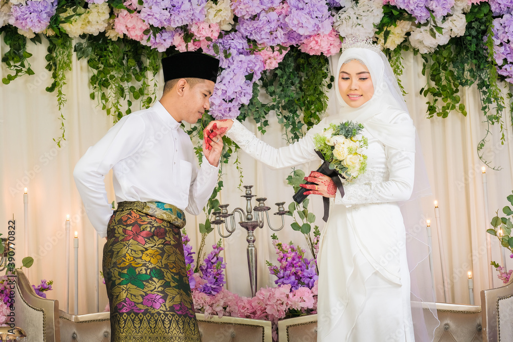 Indoor shooting for Malay wedding, the bride and groom wearing Malay ...