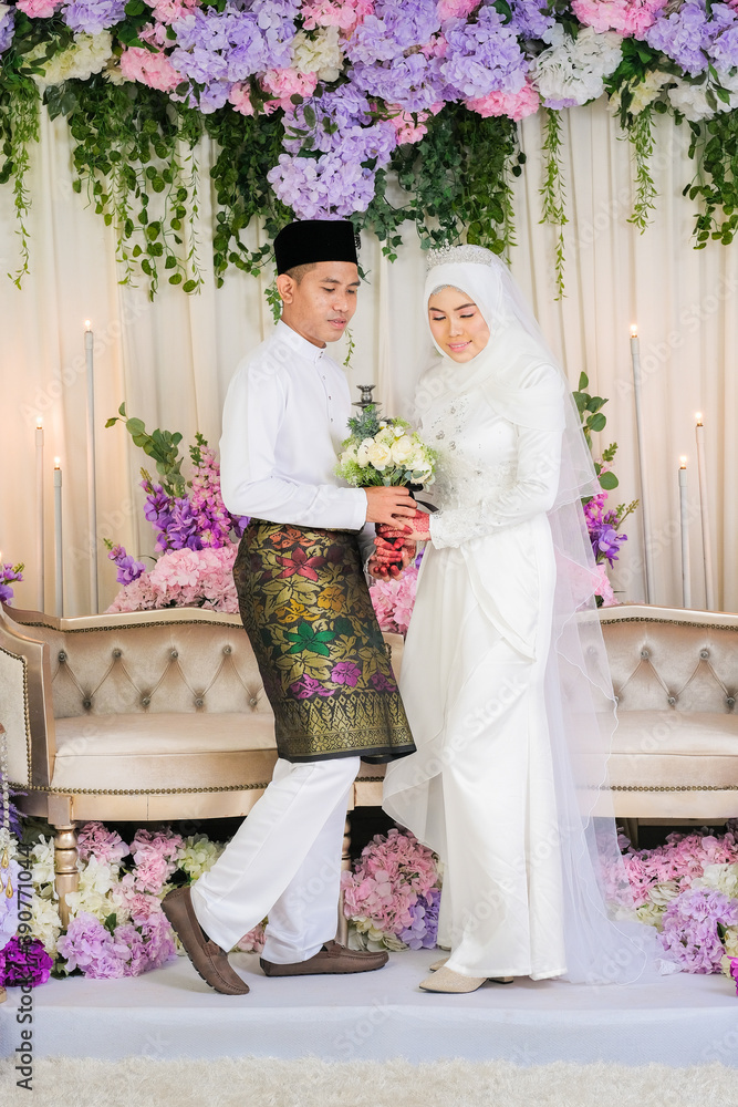 Indoor shooting for Malay wedding, the bride and groom wearing Malay ...