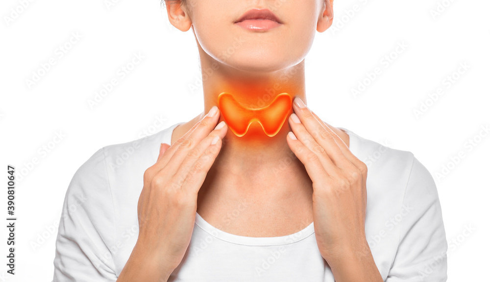 Woman showing painted thyroid gland on her neck. Enlarged butterfly ...