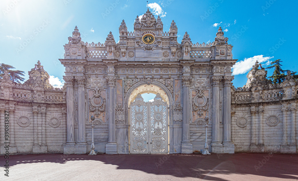 The luxurious North Gate of Dolmabahce Palace. Beautiful white stone ...