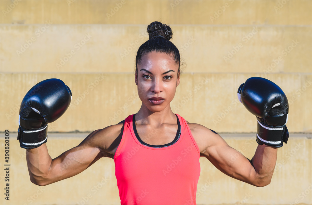 young attractive african american female boxer wearing black and pink ...