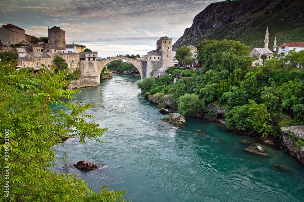 View on Mostar city with old bridge (Stari Most) over the Neretva river ...