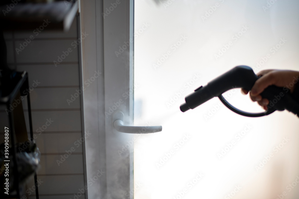 disinfection and sanitization of the house with steam, steaming frosted ...