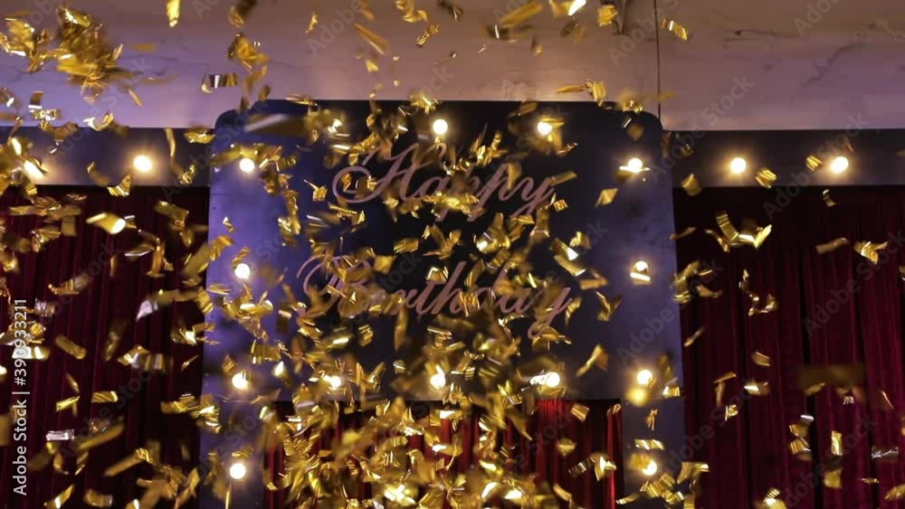 Sign with the text congratulations "Happy Birthday", confetti falling ...