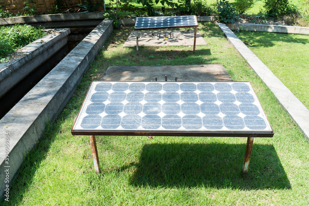 Old solar cell in public park background. Old vintage solar cell panel ...