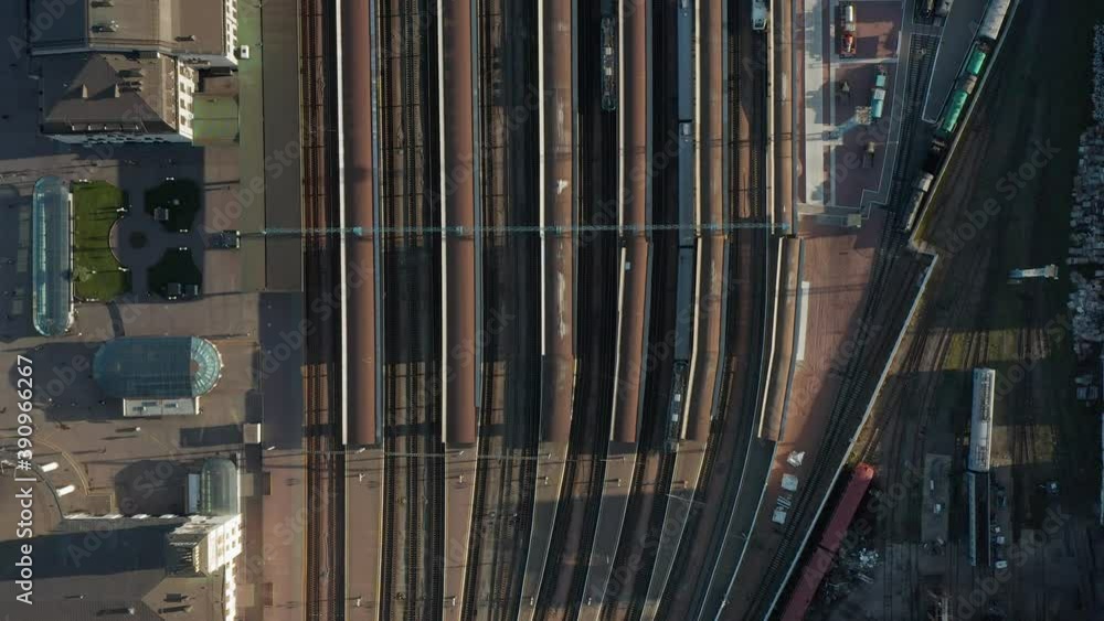 A drone flies over a train station. Aerial top view. Railway sorting ...