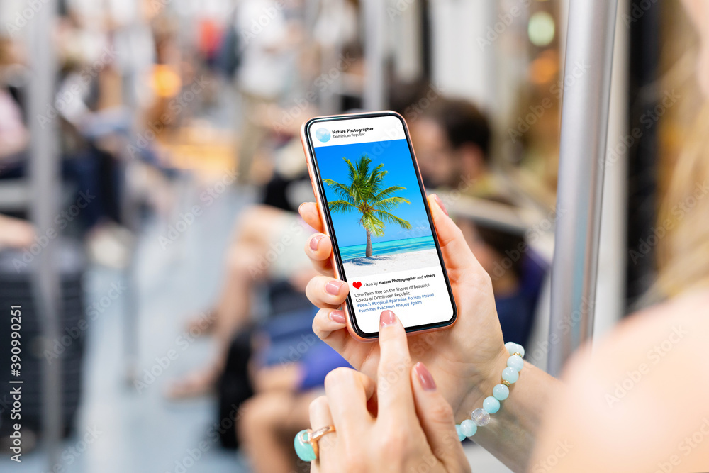 Person viewing photo gallery on smartphone Stock Photo | Adobe Stock