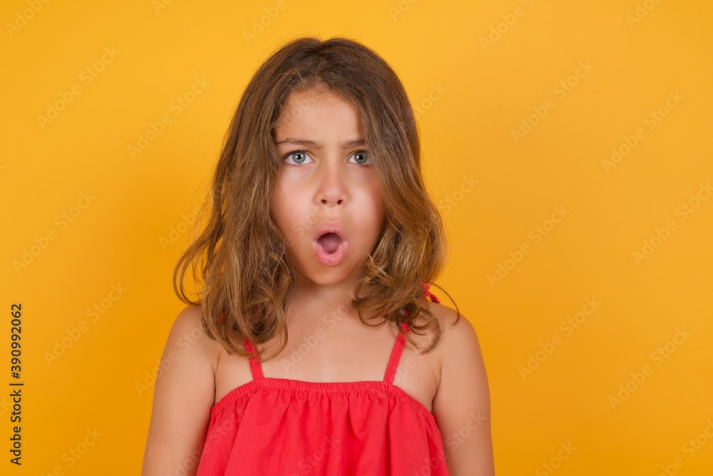 Expressive facial expressions. Shocked stupefied Caucasian young girl ...