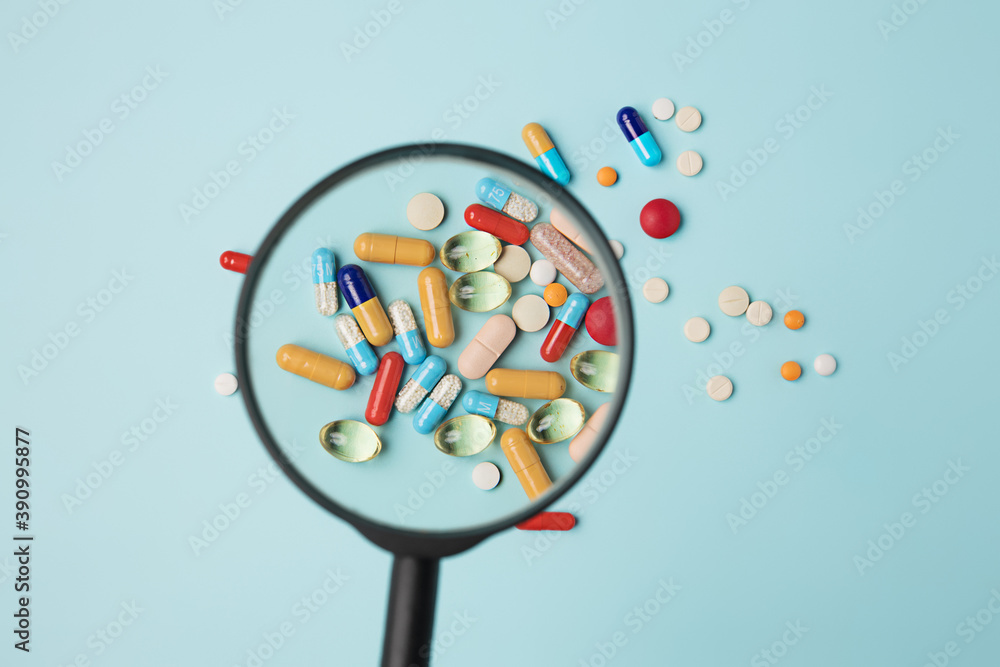 Creative medical layout made with pharmaceutical medicine pills ...