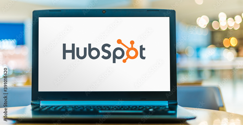 Laptop computer displaying logo of HubSpot Stock Photo | Adobe Stock