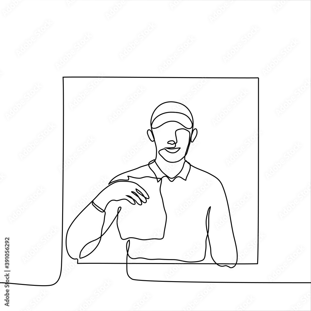 man in corporate uniform holds out a package with an order and smiles ...