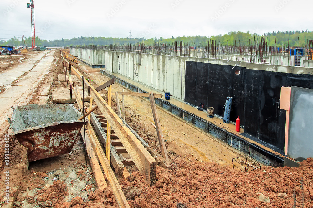 foundation pit for construction of residential building is flooded ...