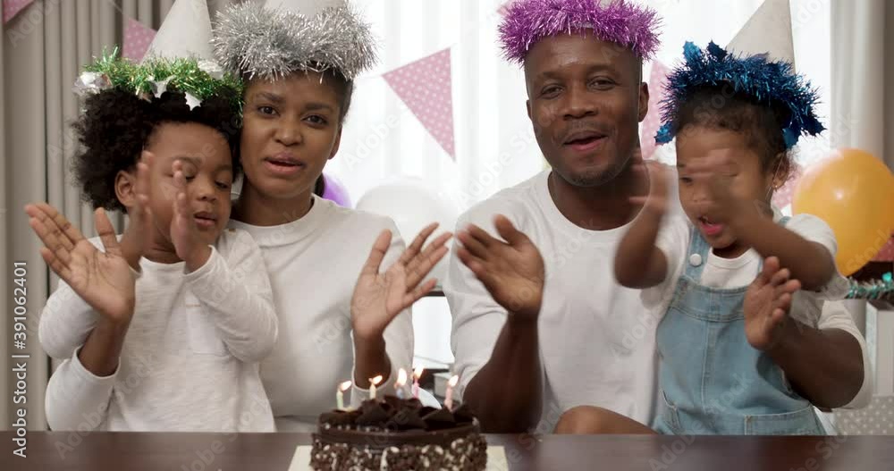 Happy black parents and little cute children african american family in ...