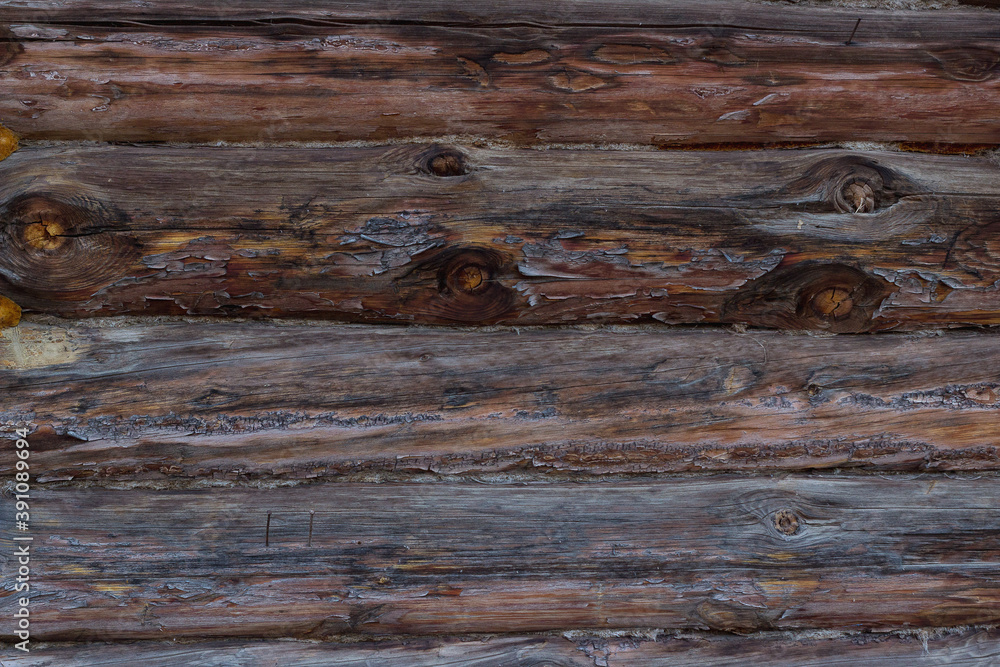 Background image of a brown pine log wall surface. Log cabin, unpainted ...