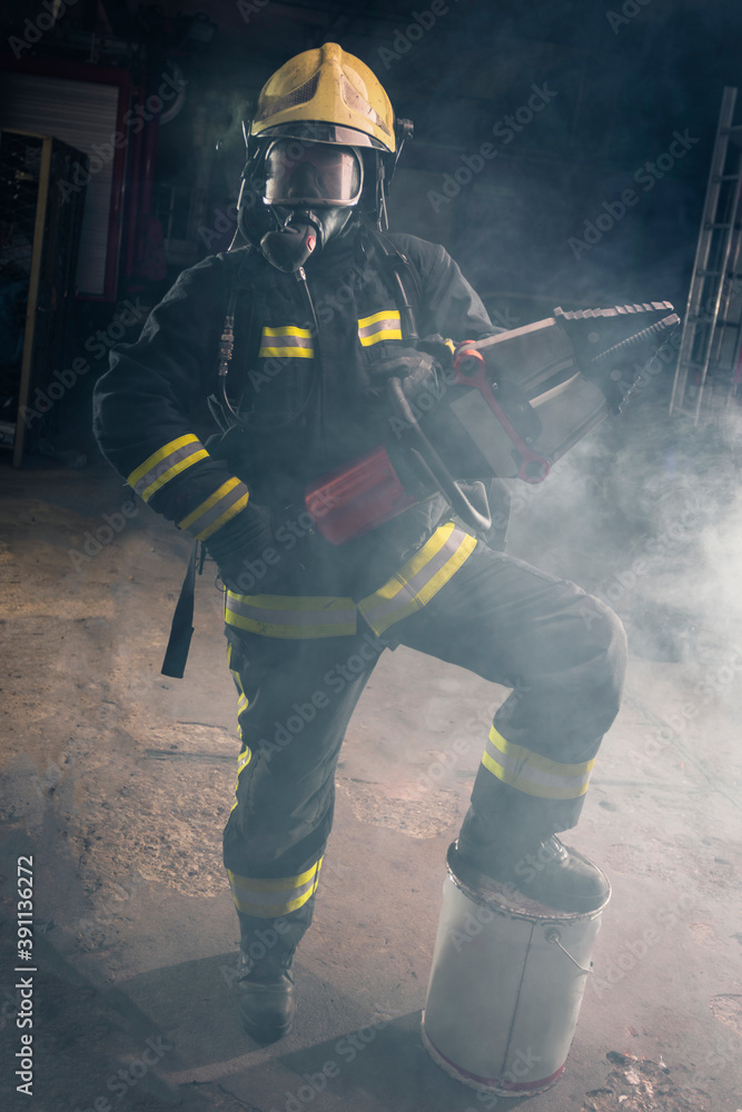 Portrait of a brave firefighter standing confident wearing full ...