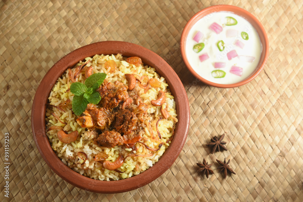 Mutton biryani , Gosht or lamb biryani or Hyderabadi Dum biriyani with ...