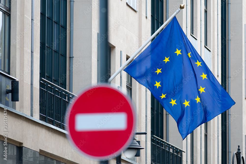 European Union flag with red and white warning no entry traffic sign ...