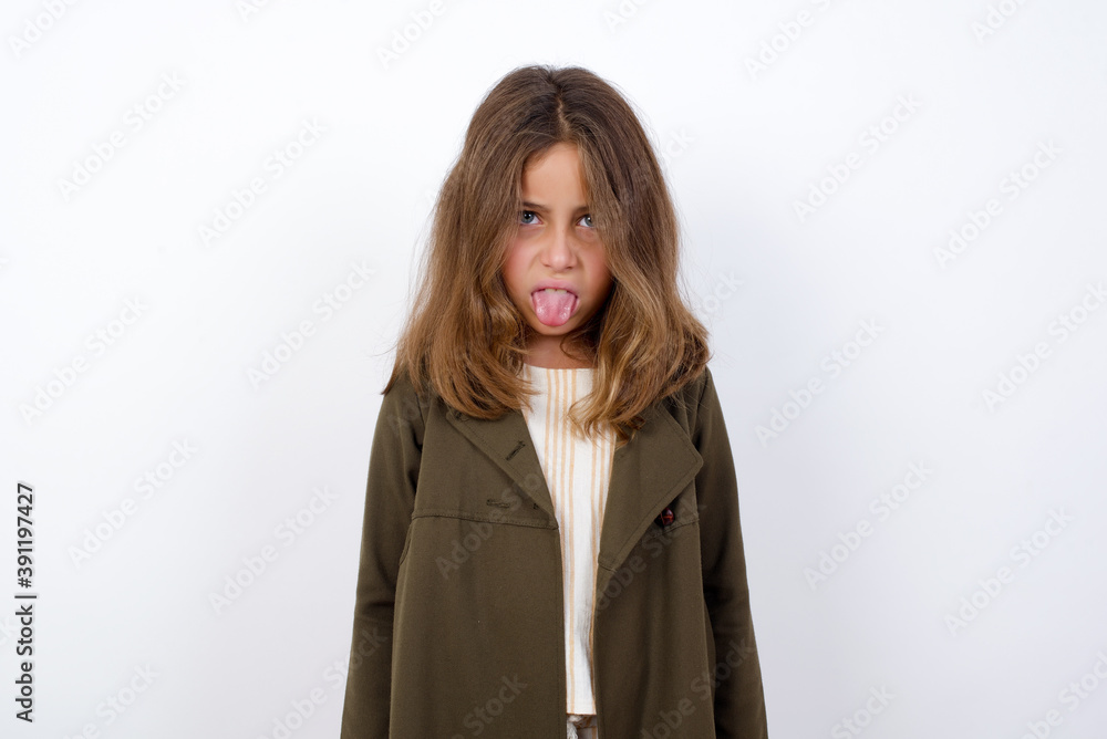 Body language. Disgusted stressed out Beautiful little girl standing ...