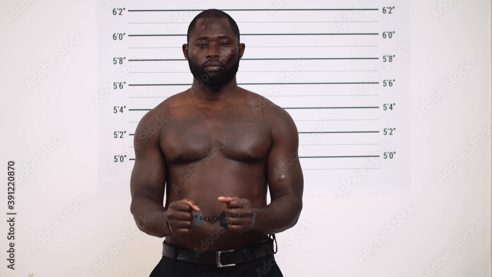 Police department mugshot of afri-american mob in handcuffs Stock Photo ...