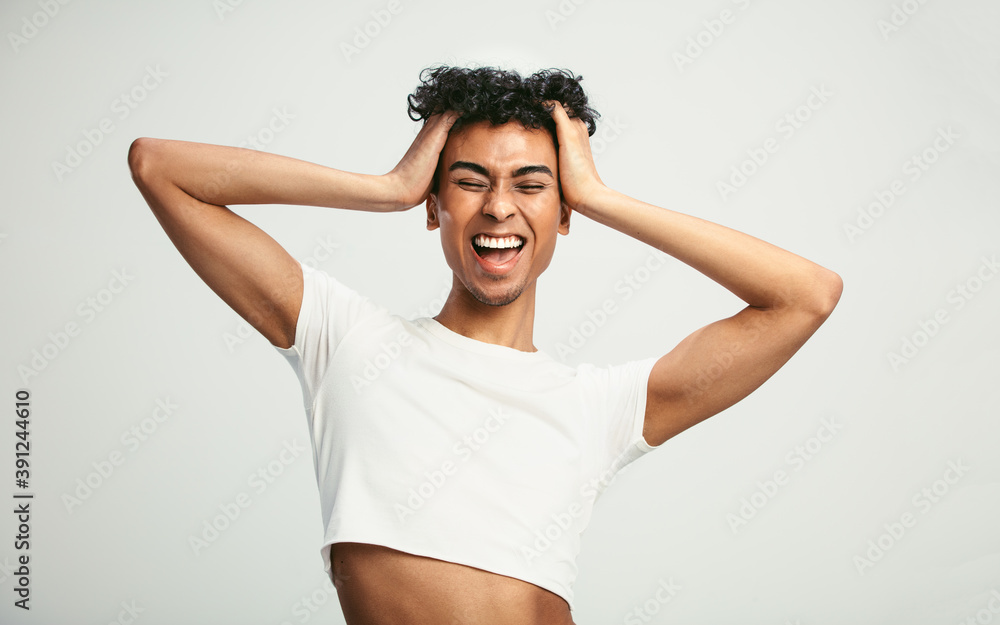 Excited gender fluid man Stock Photo | Adobe Stock