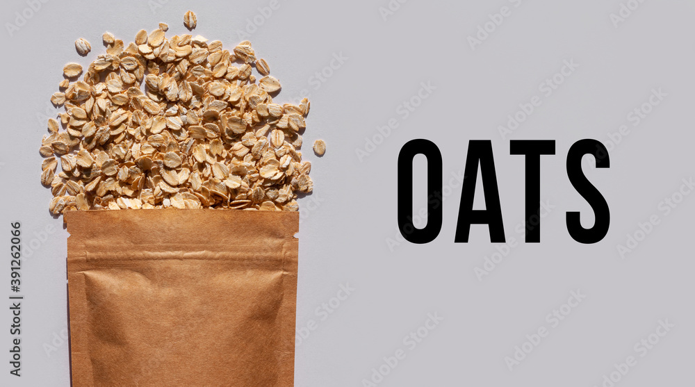 Brown kraft paper pouch bags with oats top view with harsh shadow on ...