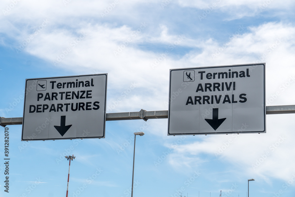 Terminal Departures and Arrivals signages arriving to an airport Stock ...