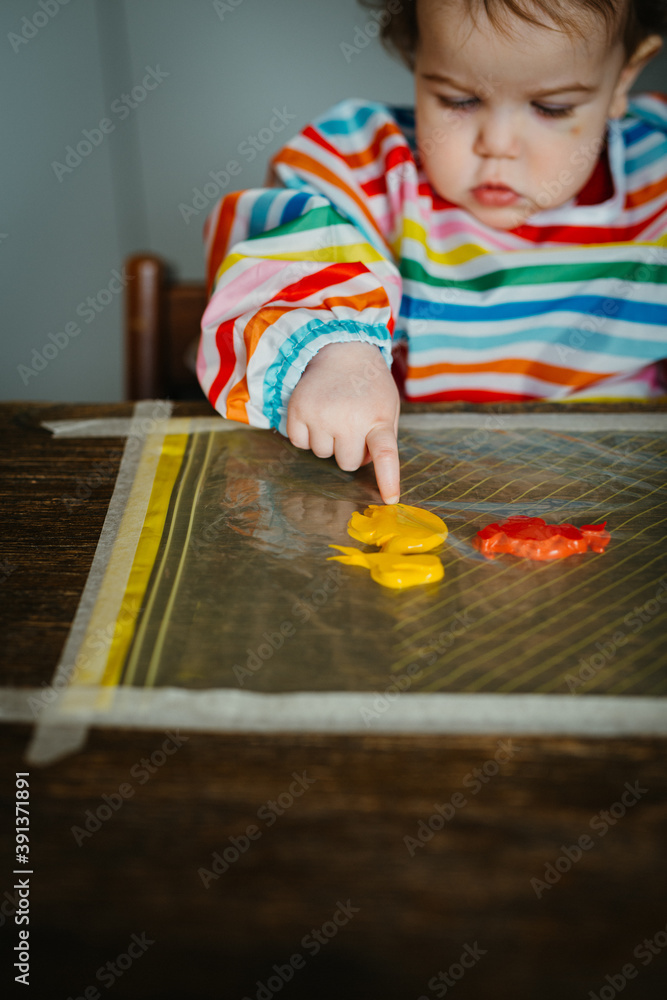 Toddler mess free finger painting with plastic bag (sensory play) Stock ...