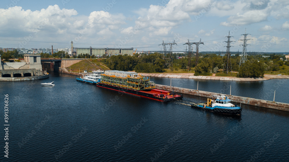 cargo ship transporting part of a gas/oil factory Stock Photo | Adobe Stock