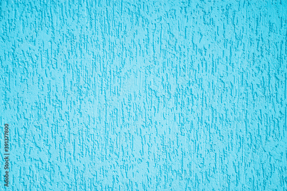 Blue wall, rough plaster, grungy background, blue wall, part of a house ...