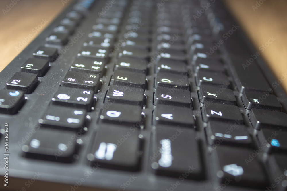 Wireless keyboard computer. Focus on the left side's keys. Stock Photo ...
