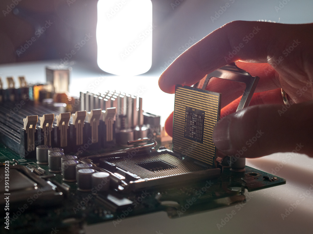 the process of connecting the CPU to the processor socket on a modern ...