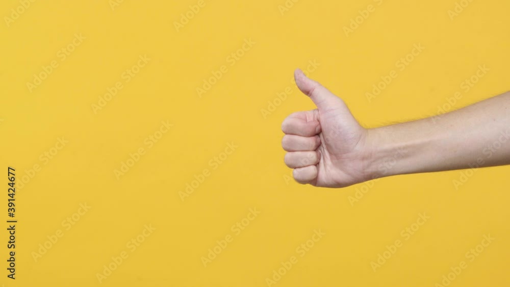 Vidéo Stock Close up of man’s hand pointing to the left side showing ...