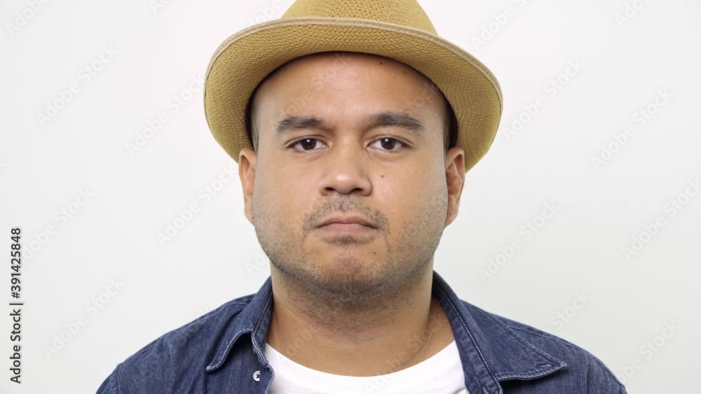 Angry Man in denim jacket closed his mouth with imaginary zipper and ...