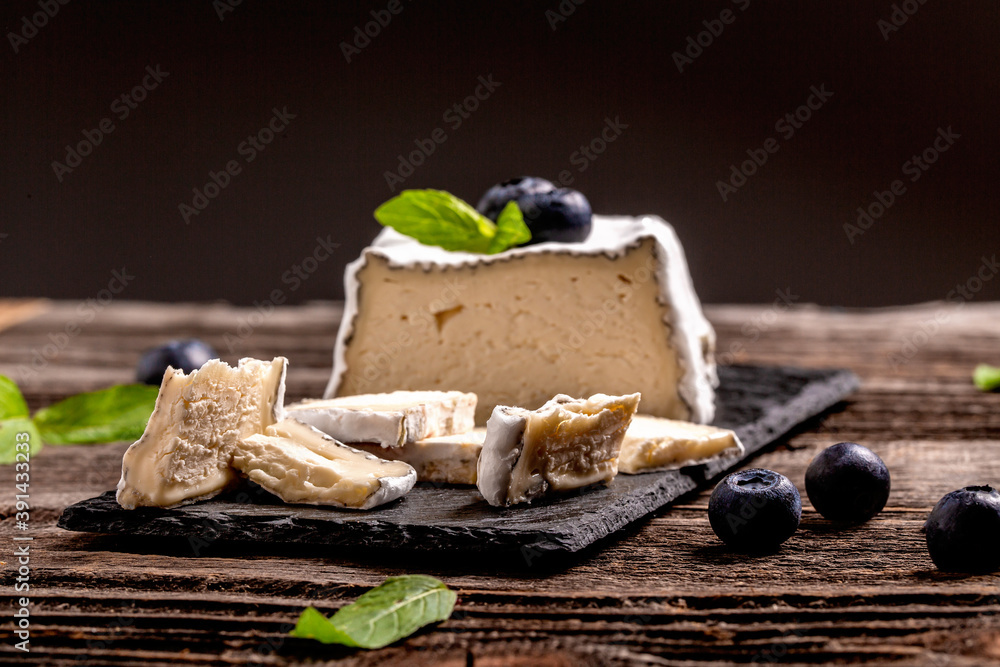 goat cheeses crottin de chavignol. Soft french cheese with ash, goat ...