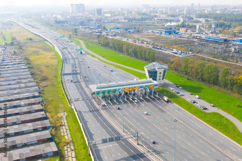 Top view aerial overloaded toll road or tollway on the controlled ...