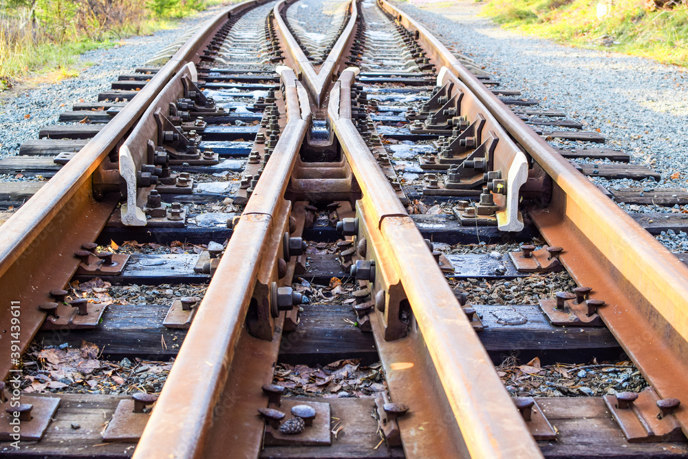 Image of an empty railroad track stretching far away. Crossing railway ...