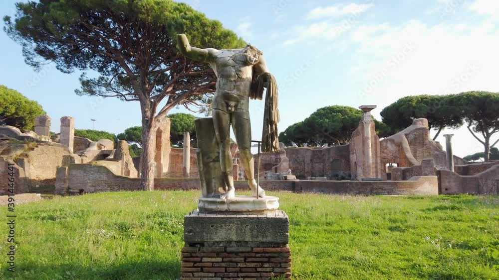 Roman statue representing a male located in Ostia antica, a huge and ...