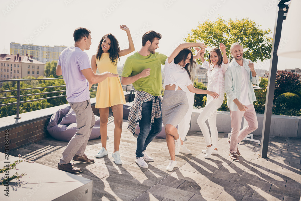 Photo of friendly pretty girls handsome guys have fun dancing party on ...