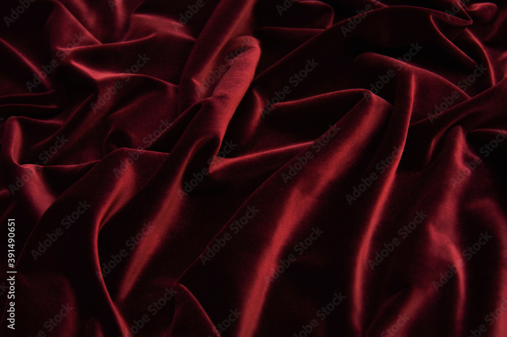 Abstract background of luxury dark red velvet cloth with wavy folds ...