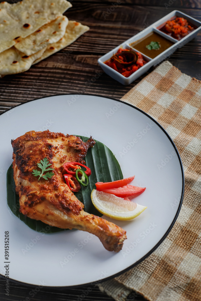 Tandoori Chicken. Indian barbecue chicken. Indian chicken dish prepared ...