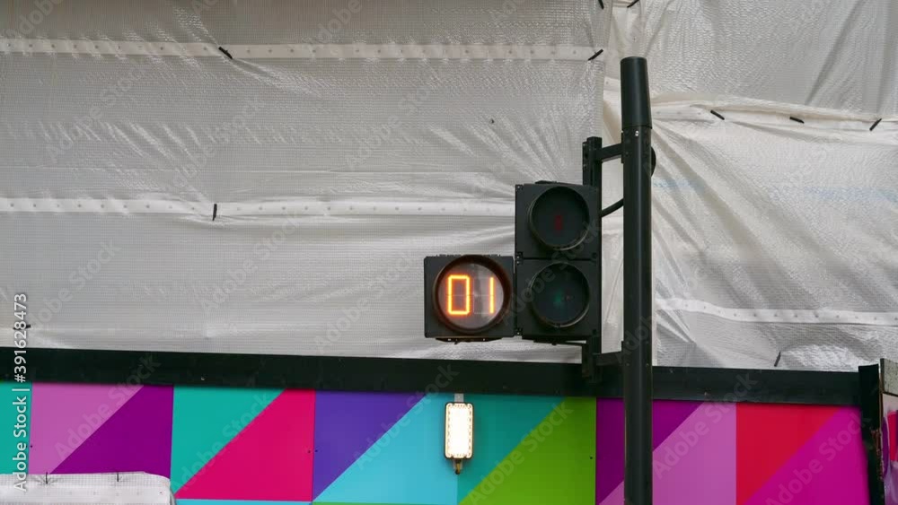 Pedestrian crossing green man go signal turns to countdown from 3 ...