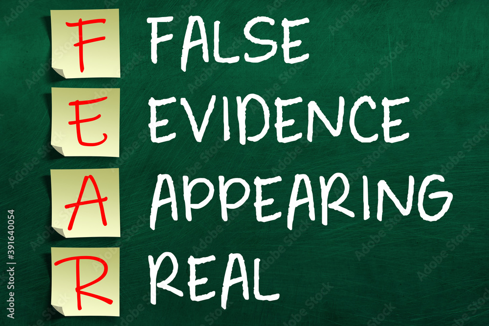 Foto Stock Motivating And Inspiring FEAR Acronym On Sticky Notes Posted
