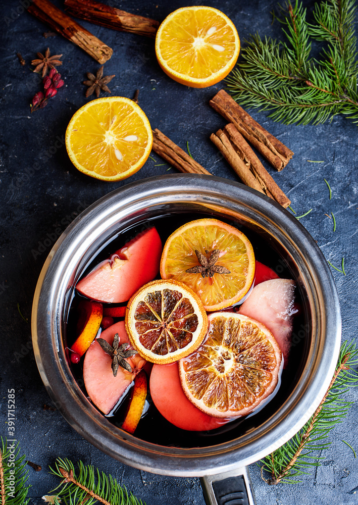 Making hot alcohol, mulled wine for sale at country fair. Glintwine ...